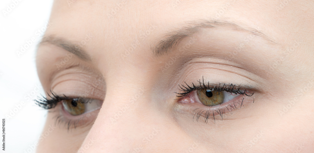 Upper part of females face closeup on eyes looking down Stock Photo ...