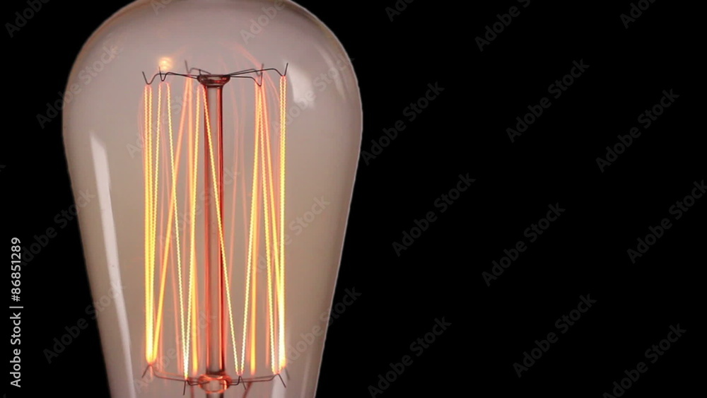 Flickering Vintage Filament Edison Light Bulb Stock Video | Adobe Stock