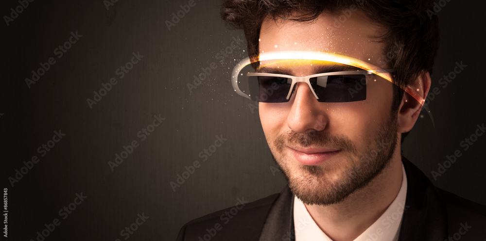 Handsome man looking with futuristic high tech glasses Stock Photo ...