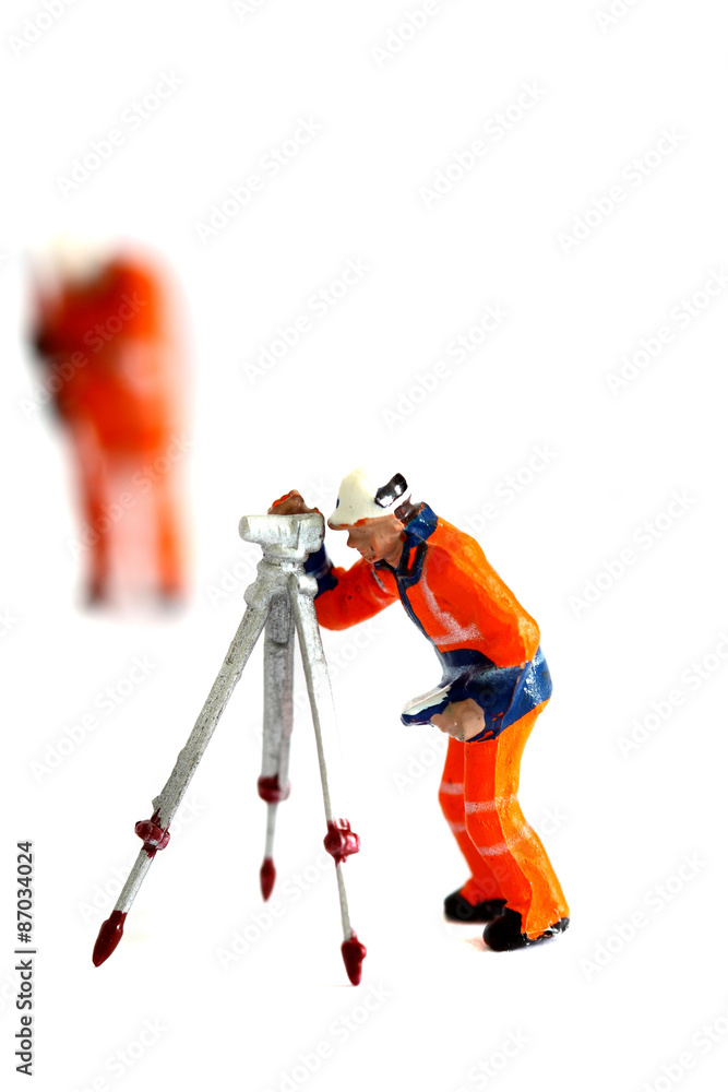 Miniature construction workers. Miniature scale model construction ...