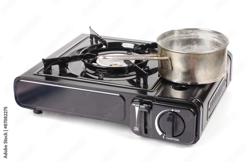 Portable gas stove with pot isolated on white background Stock Photo ...