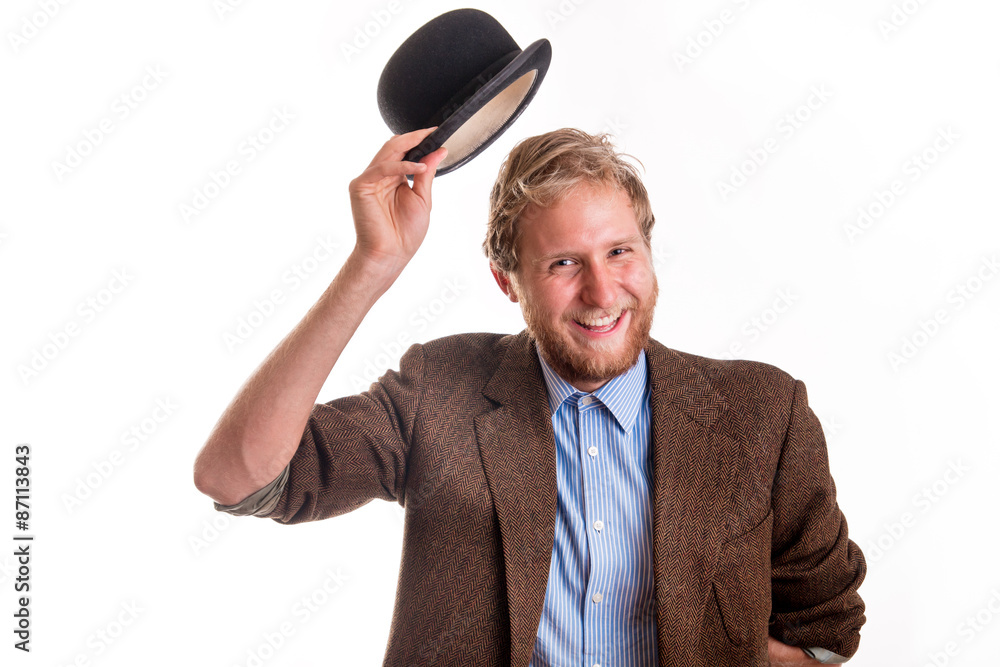 Cheerful bearded man greets by taking off a hat Stock Photo | Adobe Stock
