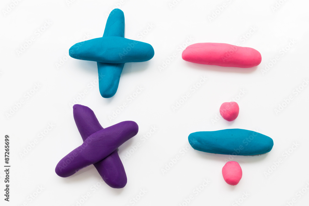plasticine Plus minus multiply divide shape on white background Stock ...