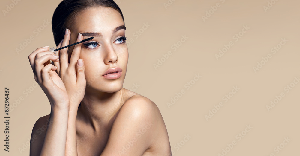 Mascara applying. Makeup closeup. Eyes make-up / photos of appealing ...