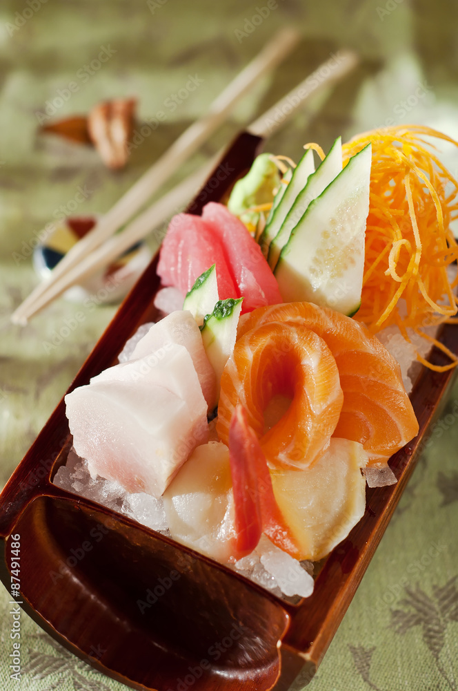 Sashimi with fresh raw fish. salmon, tuna, yellowtail, red snapper with ...