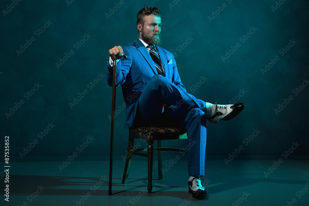 Elegant retro style gentleman with a cane Stock Photo | Adobe Stock