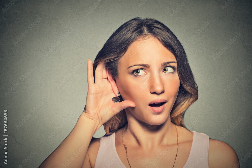 surprised nosy woman hand to ear gesture carefully secretly listening ...