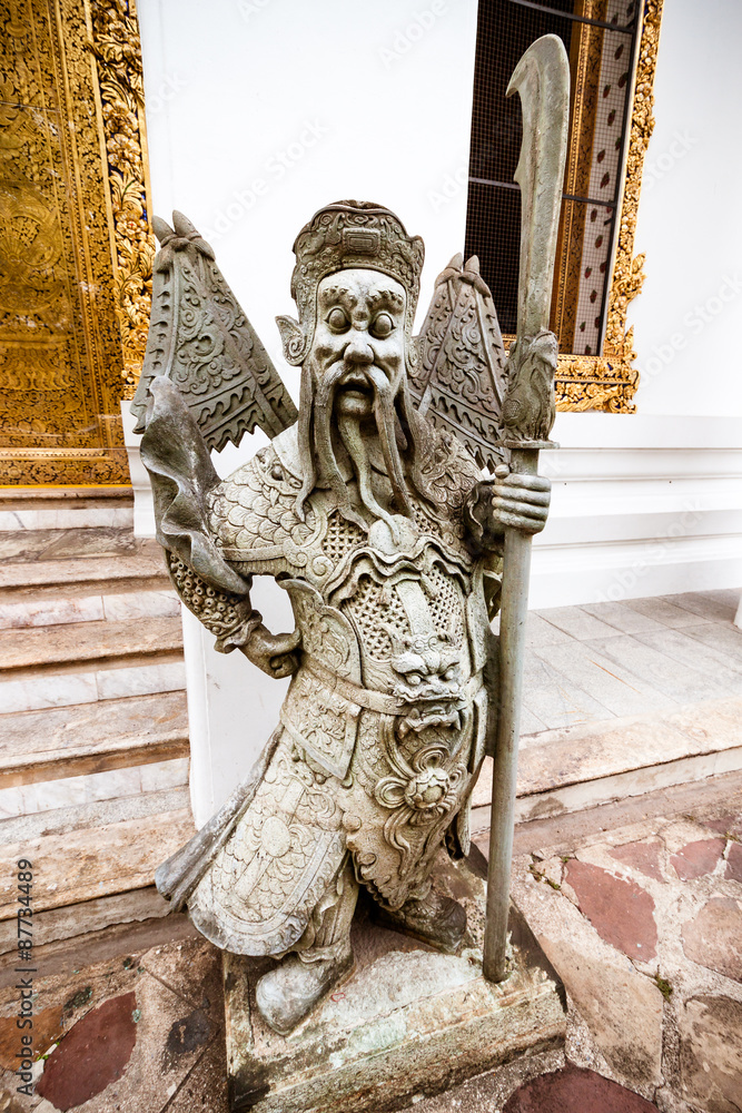 Chinese stone guardian statue in Wat Pho Buddhist Temple Bangkok Stock ...