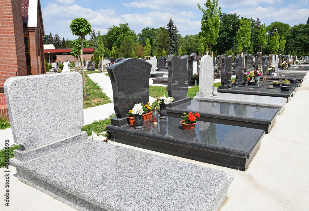 Tombstones in the public cemetery Stock Photo | Adobe Stock