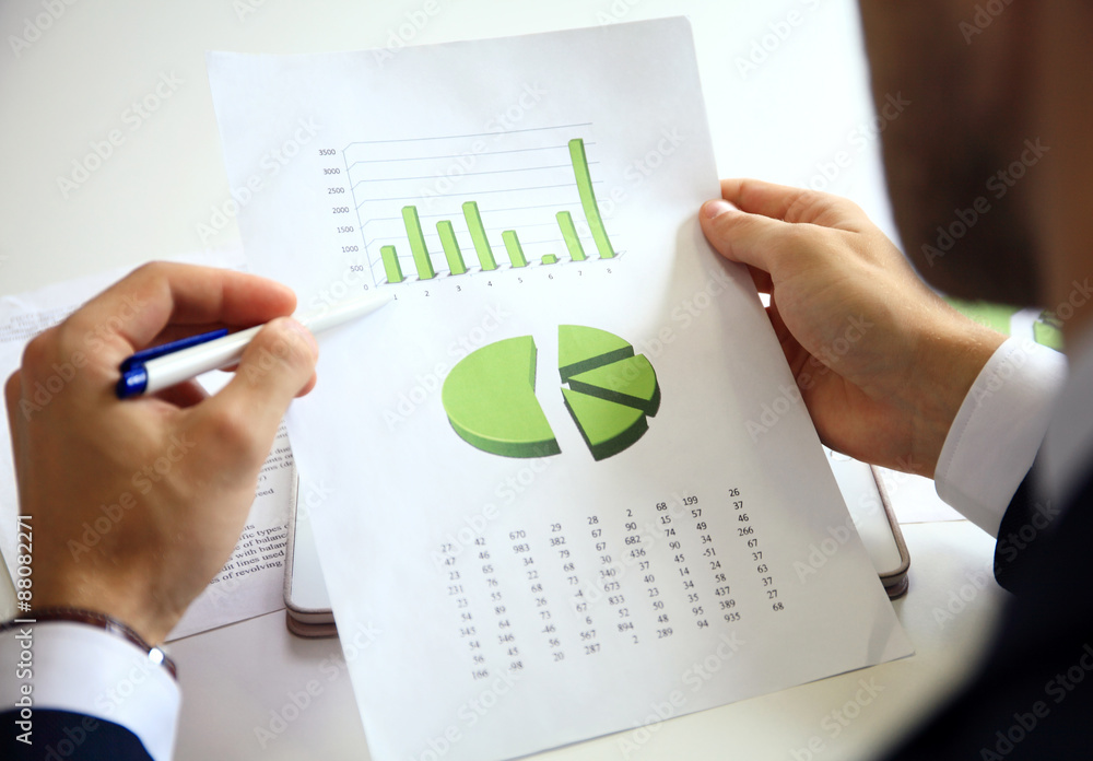 Image of human hand pointing at paper during explanation Stock Photo ...