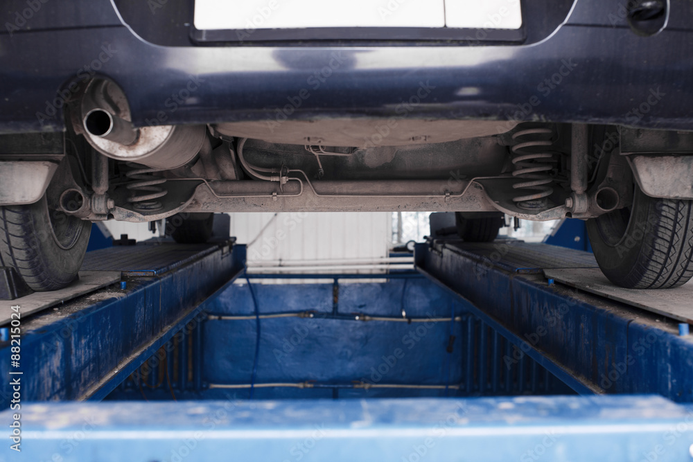 car bottom view. the photo shows the bottom of the car in auto repair ...