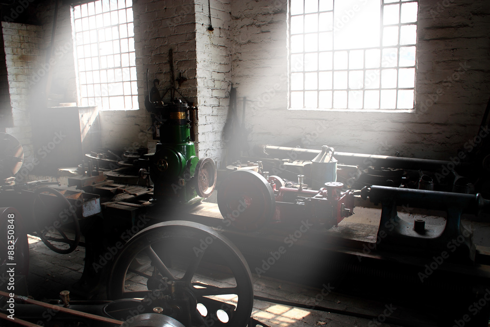 Factory light rays old. Light rays shining through window of an old ...