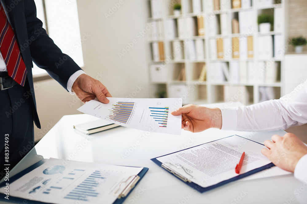 Giving report to boss Stock Photo | Adobe Stock