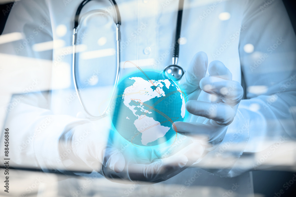 Medical Doctor holding a world globe in his hands as medical net Stock ...