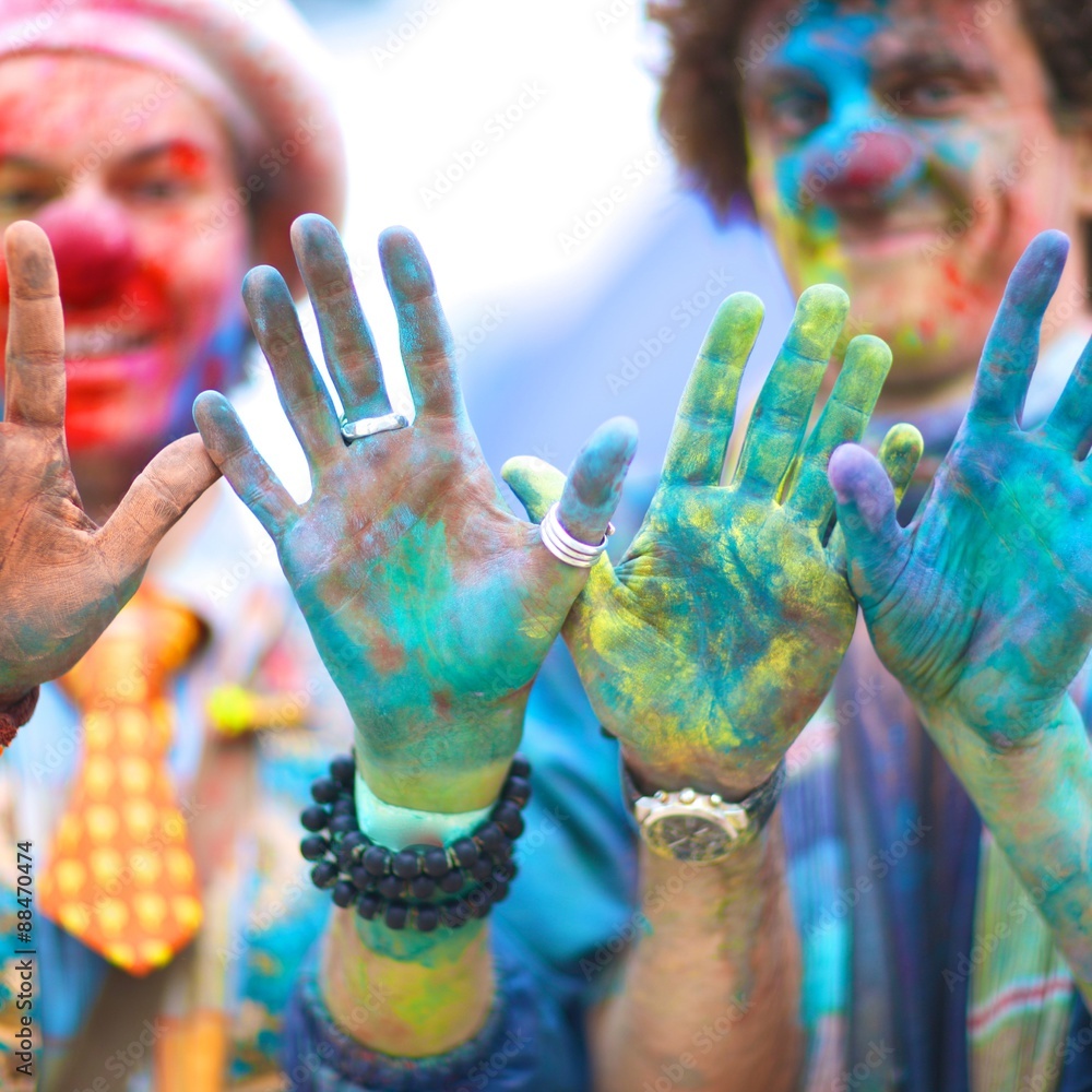 Happy clowns painted in vibrant colors Stock Photo | Adobe Stock