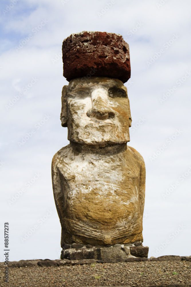 Statue (moai) with topknot called pukao at Ahu Tongariki.Easter Island ...