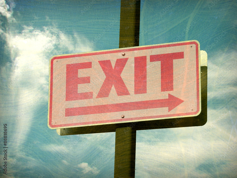 aged and worn vintage photo of old exit sign Stock Photo | Adobe Stock