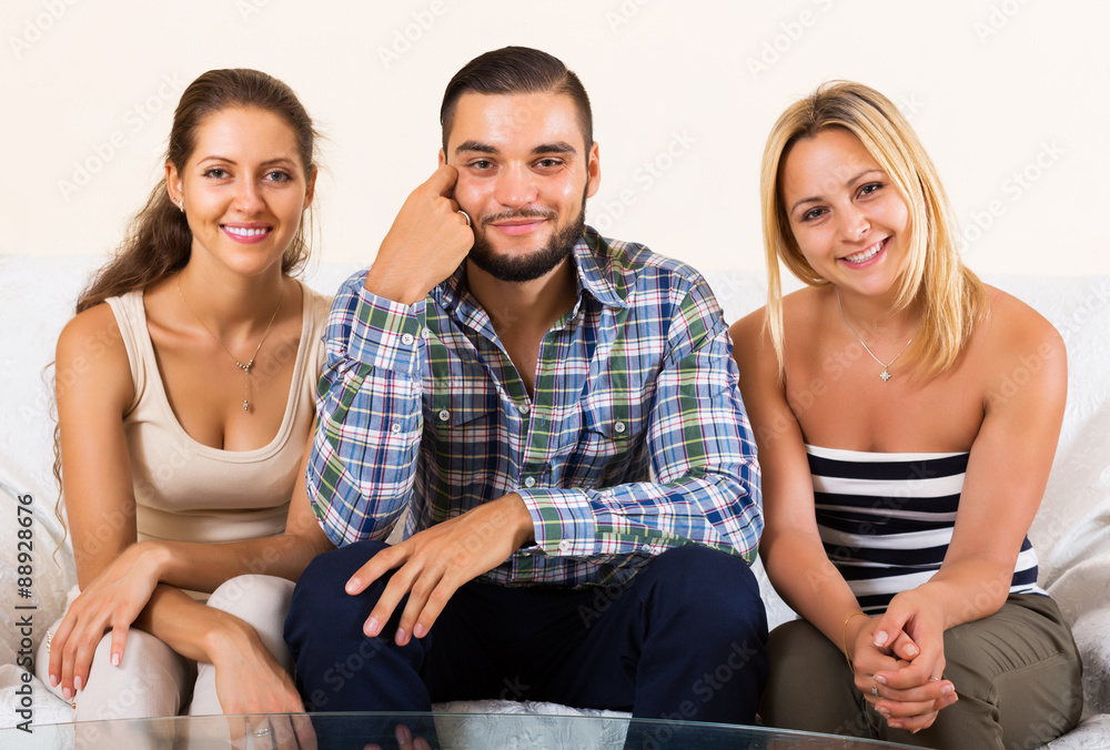 Two charming girls with boyfriend Stock Photo | Adobe Stock
