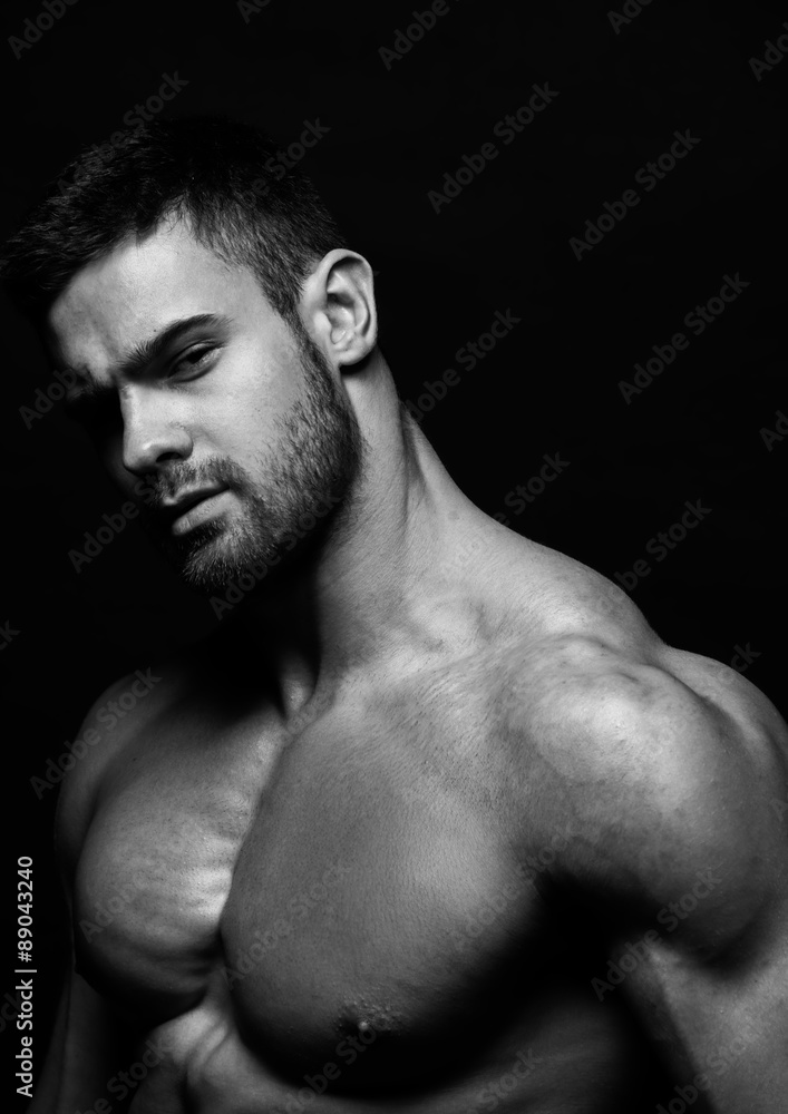 Muscled male model in studio Stock Photo | Adobe Stock