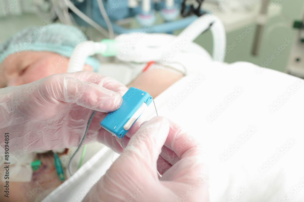Doctor connects the pacemaker to a patient Stock Photo | Adobe Stock