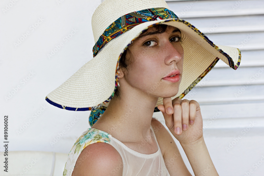 Beautiful young girl with beauty skin and a thoughtful look in the big ...