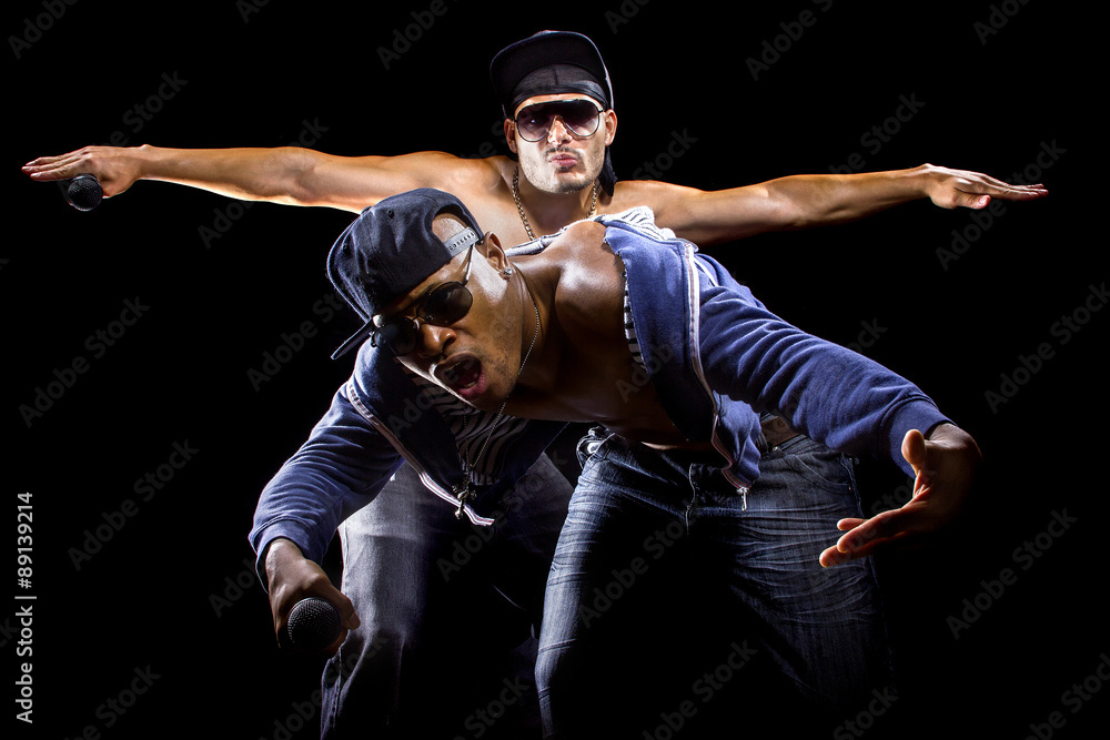 Rap concert with two muscular shirtless men with microphones Stock ...