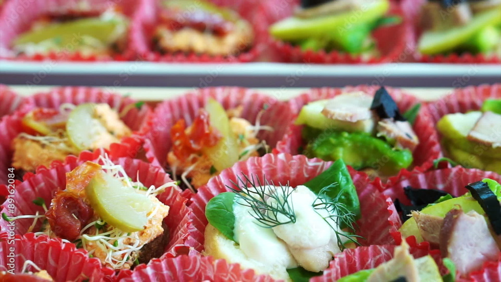 Picking finger food, canapés sandwiches at party buffet Stock Video ...