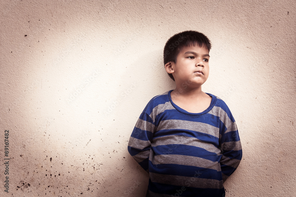 asian boy sad alone standing near old wall cement,vintage tone Stock ...