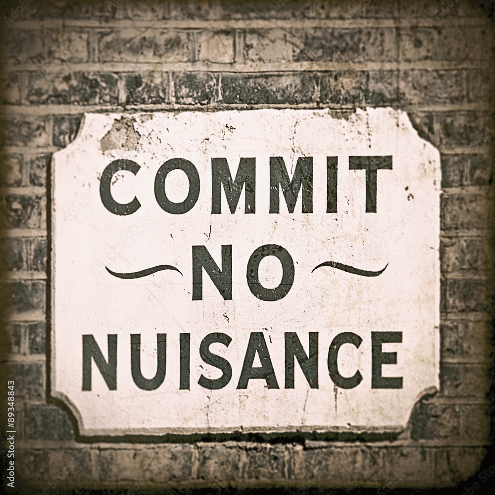 This old 'Commit no nuisance' street sign was photographed in the old ...