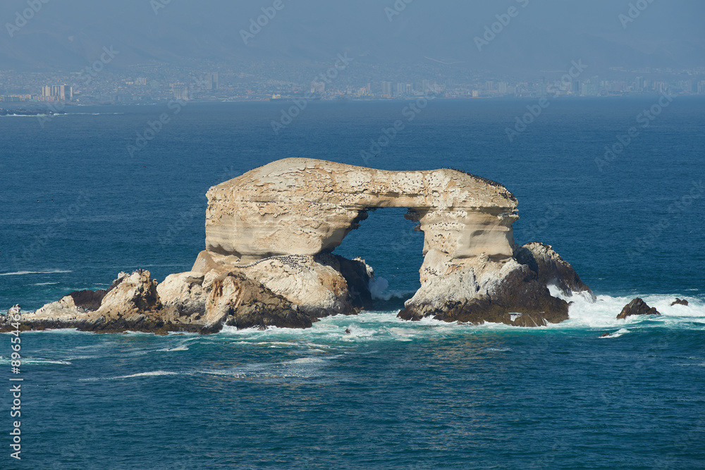 La Portada. A natural arch in the Pacific Ocean near Antofagasta in ...