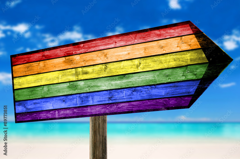 LGBT in a Rainbow wooden sign with a beach background Stock Photo ...