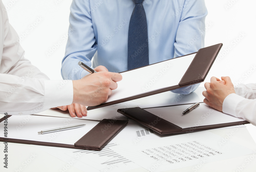 Manager signing a contract, white background Stock Photo | Adobe Stock