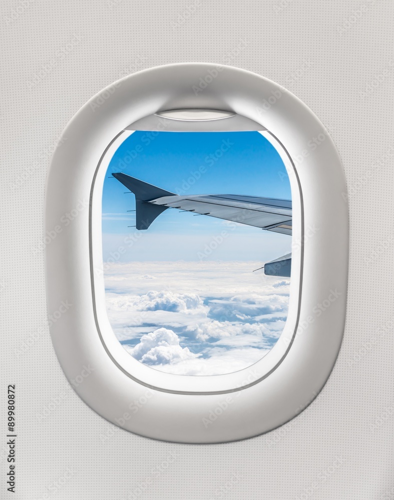 Looking out the window of a plane to the aircraft wing and cloud Stock ...