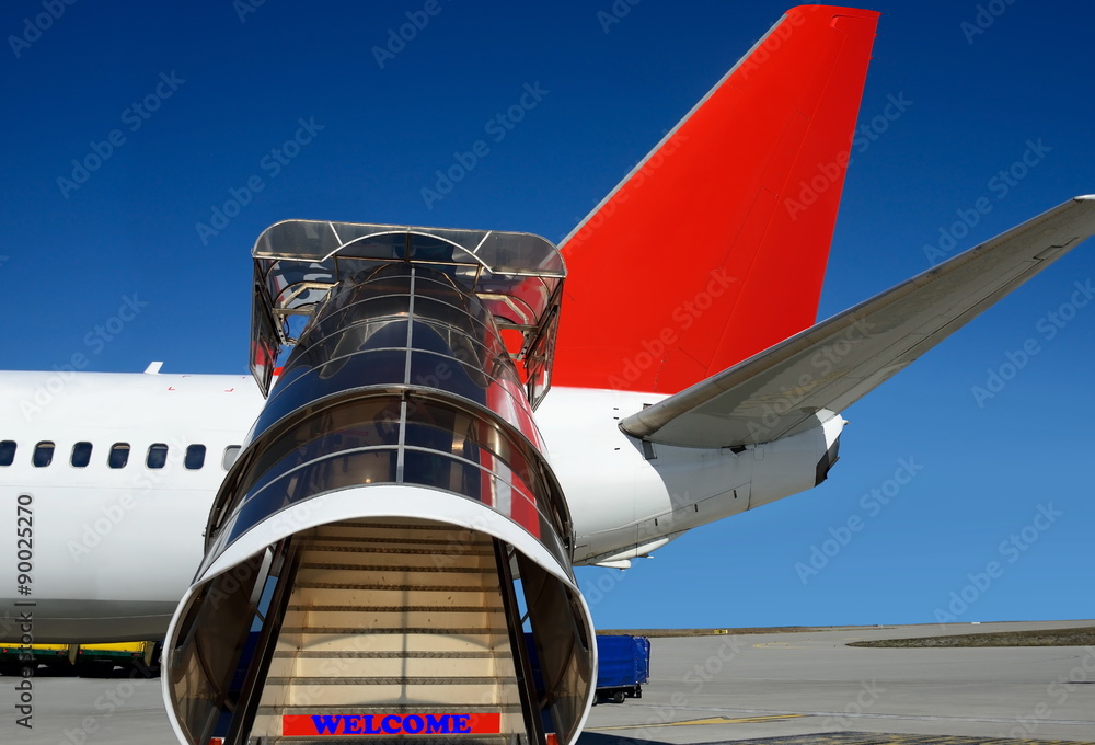 Plane red tail, airport ramp. / The jet plane with the eye taking red ...