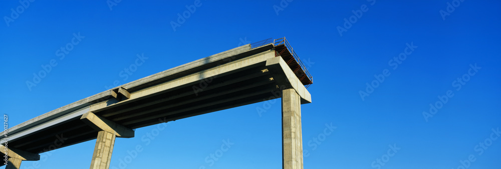 This is an unfinished freeway or dead end road. There is a huge drop ...