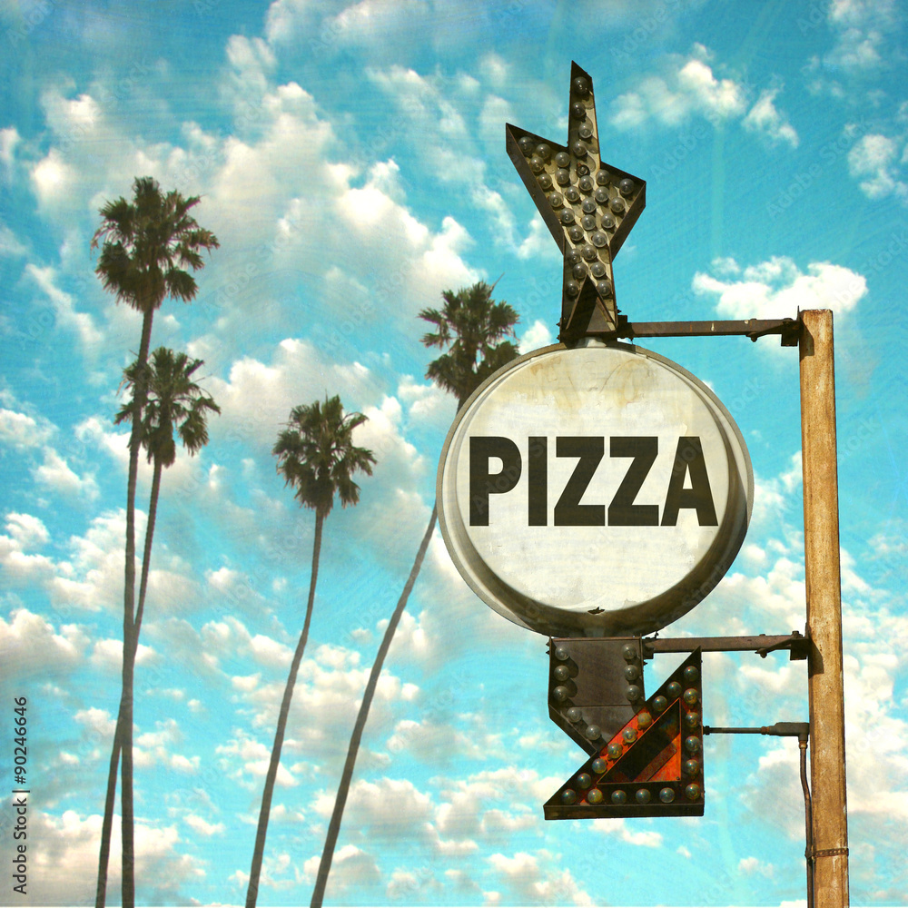 aged and worn vintage photo of pizza sign with palm trees Stock Photo ...