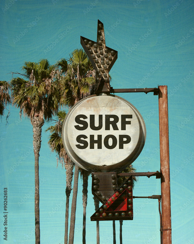aged and worn vintage photo of surf shop sign with palm trees Stock ...