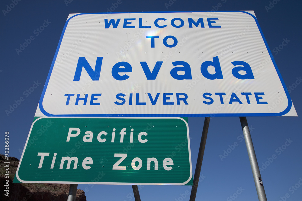 "Welcome to Nevada - the Silver State"" Road sign and ""Pacific Time ...