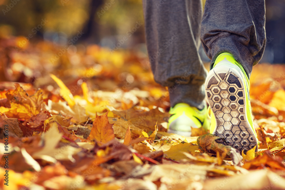 Runner woman feet running on autumn road closeup on shoe. Female ...
