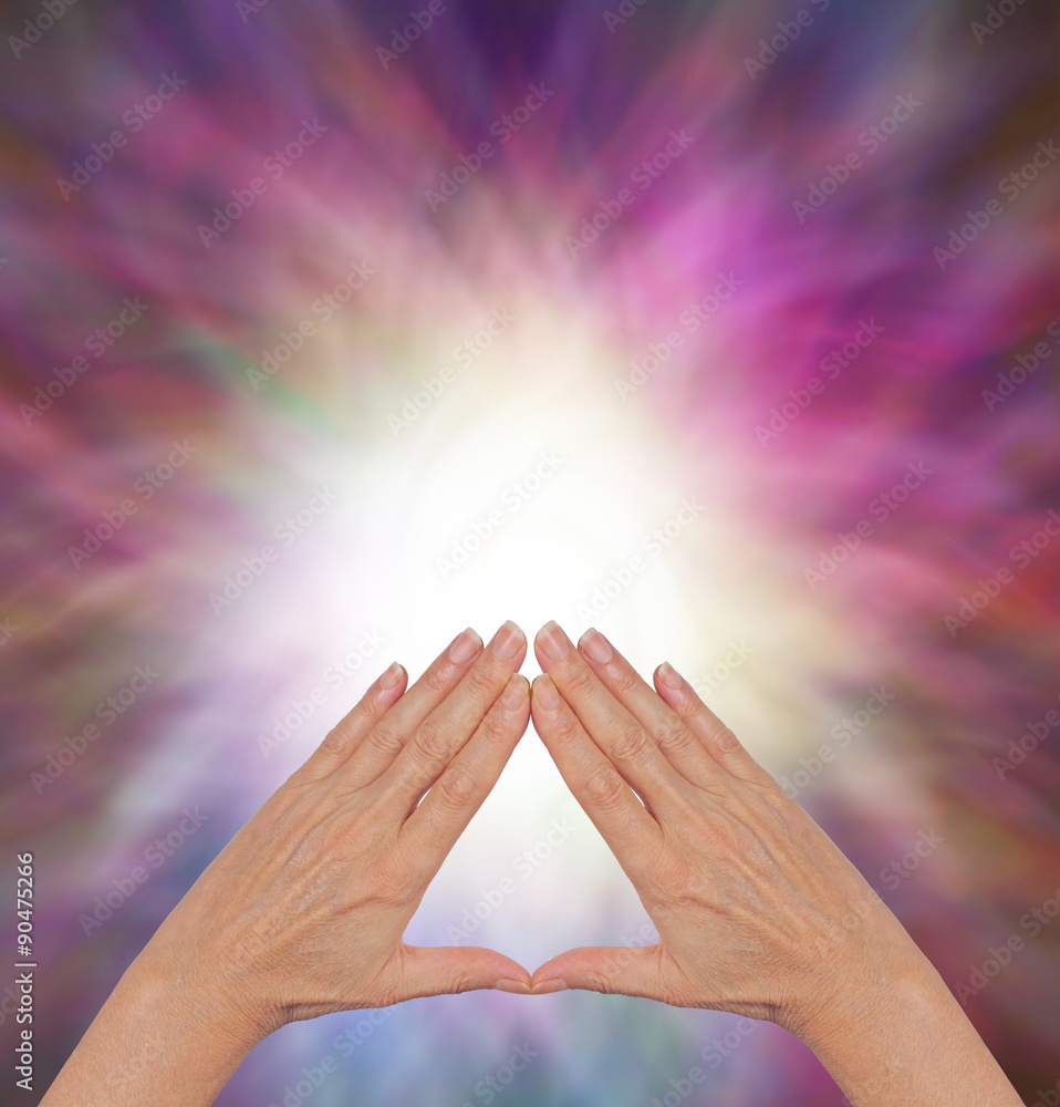 The Power of Pyramid Healing - female hands making a triangle shape on ...