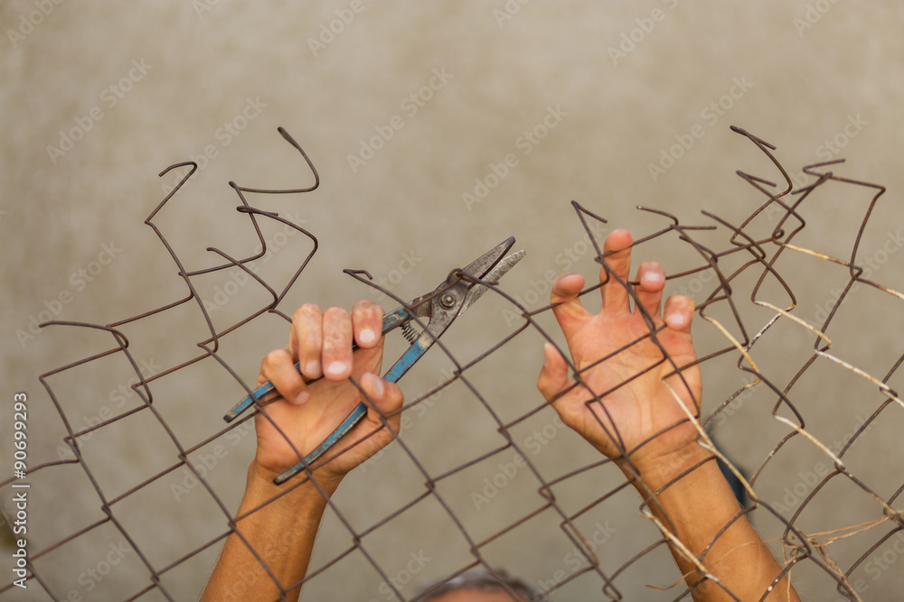Breaking down the fence Stock Photo | Adobe Stock