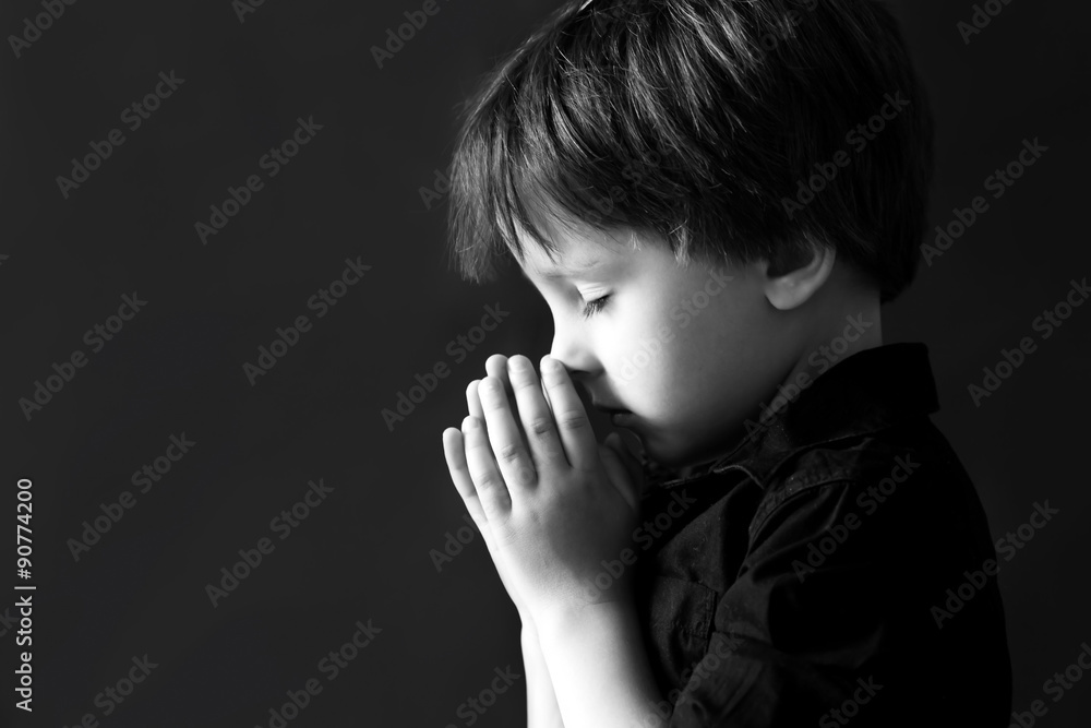 Little boy praying, child praying, isolated background Stock Photo ...