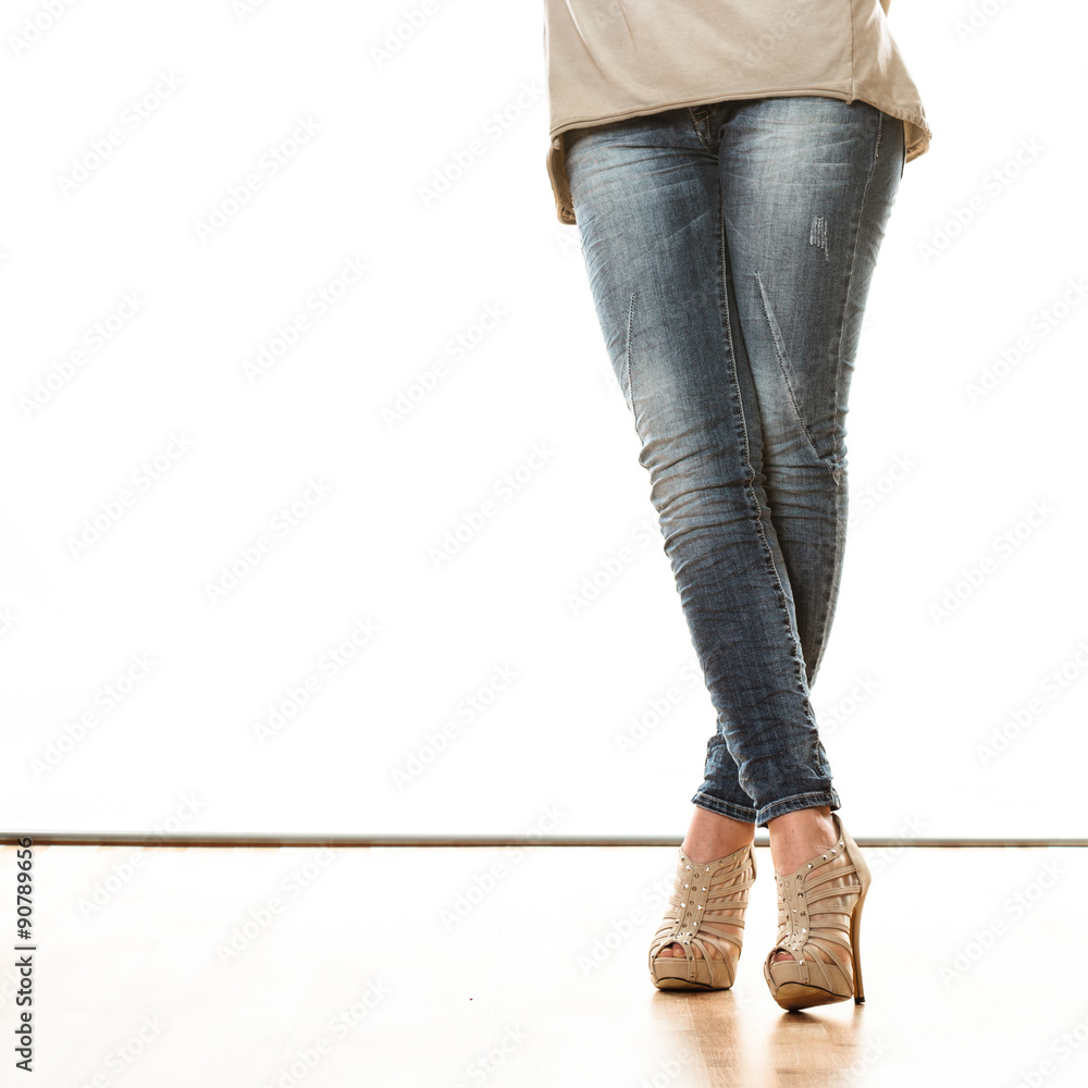 woman legs in denim trousers high heels shoes Stock Photo | Adobe Stock