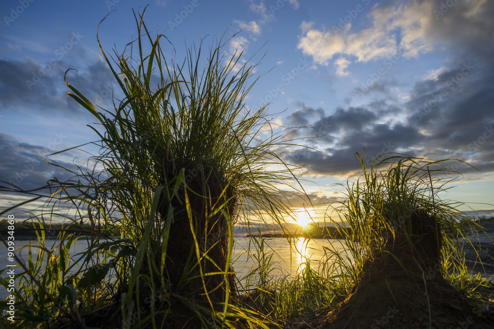 Two hairy mounds at sunset. Stock Photo | Adobe Stock