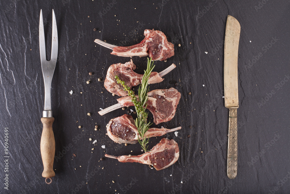 Rack of lamb, Raw rack of lamb cut in pieces decorate and seasoning ...