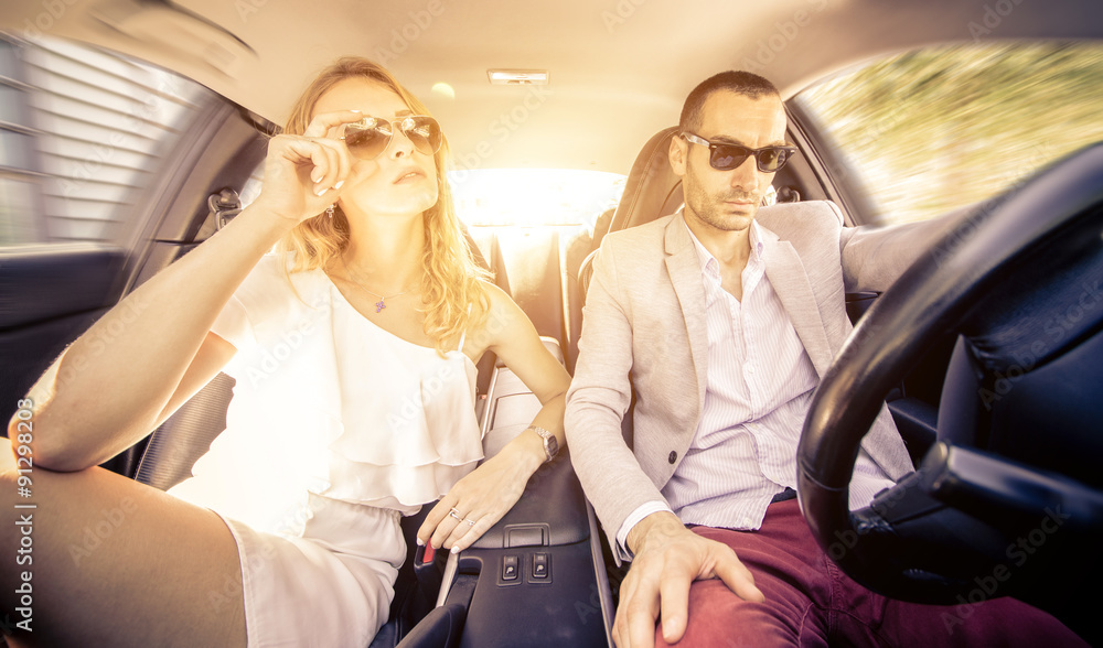 couple driving fast on a sport car. concept about relationship ...