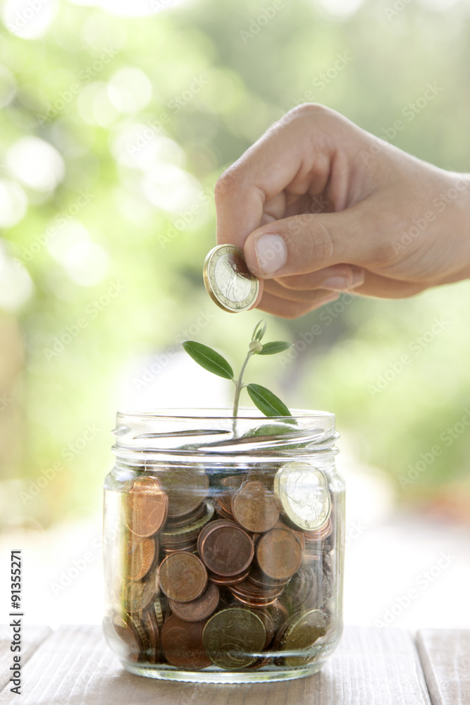 pot with coins saving concept Stock Photo | Adobe Stock