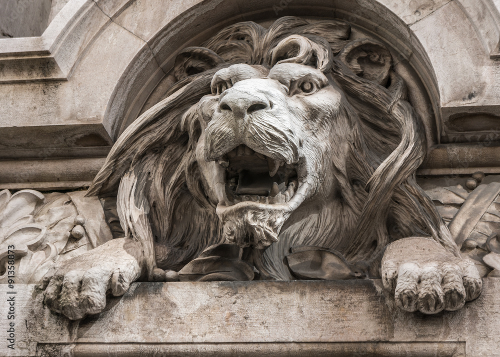 Lion head relief on the facade Stock-Foto | Adobe Stock