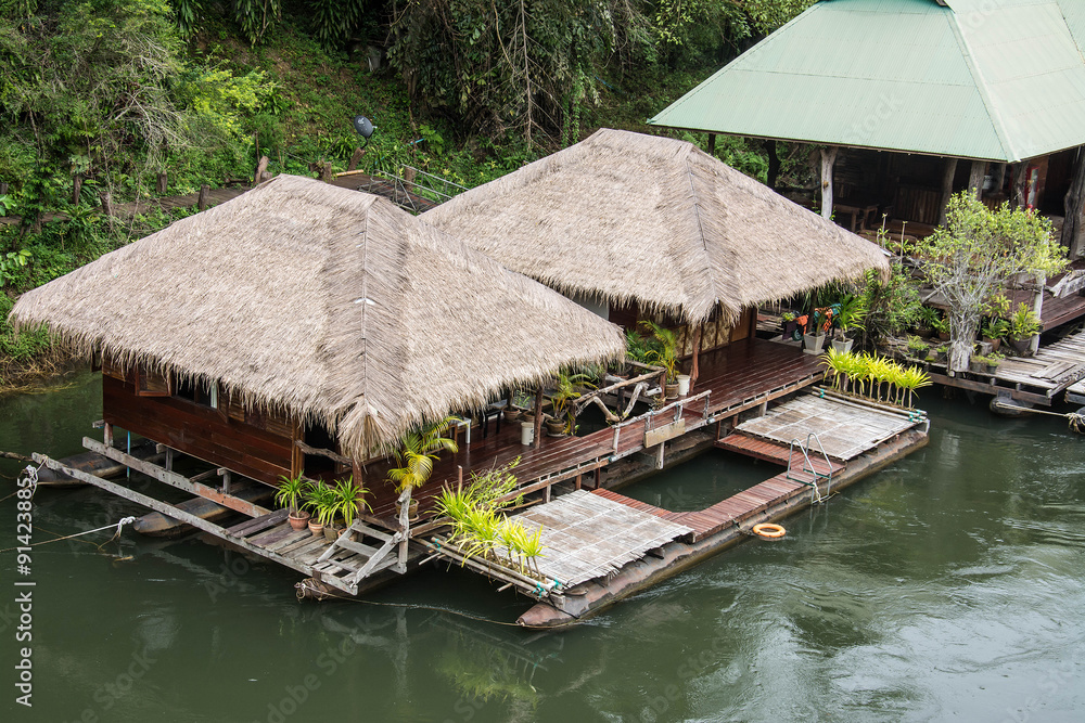floating house in river Kwai. Taken at Sai Yok Yai waterfall ...