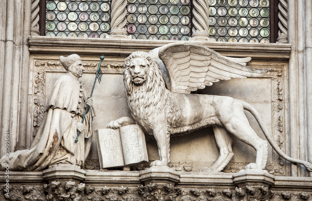 Winged lion and religious statue Stock Photo | Adobe Stock